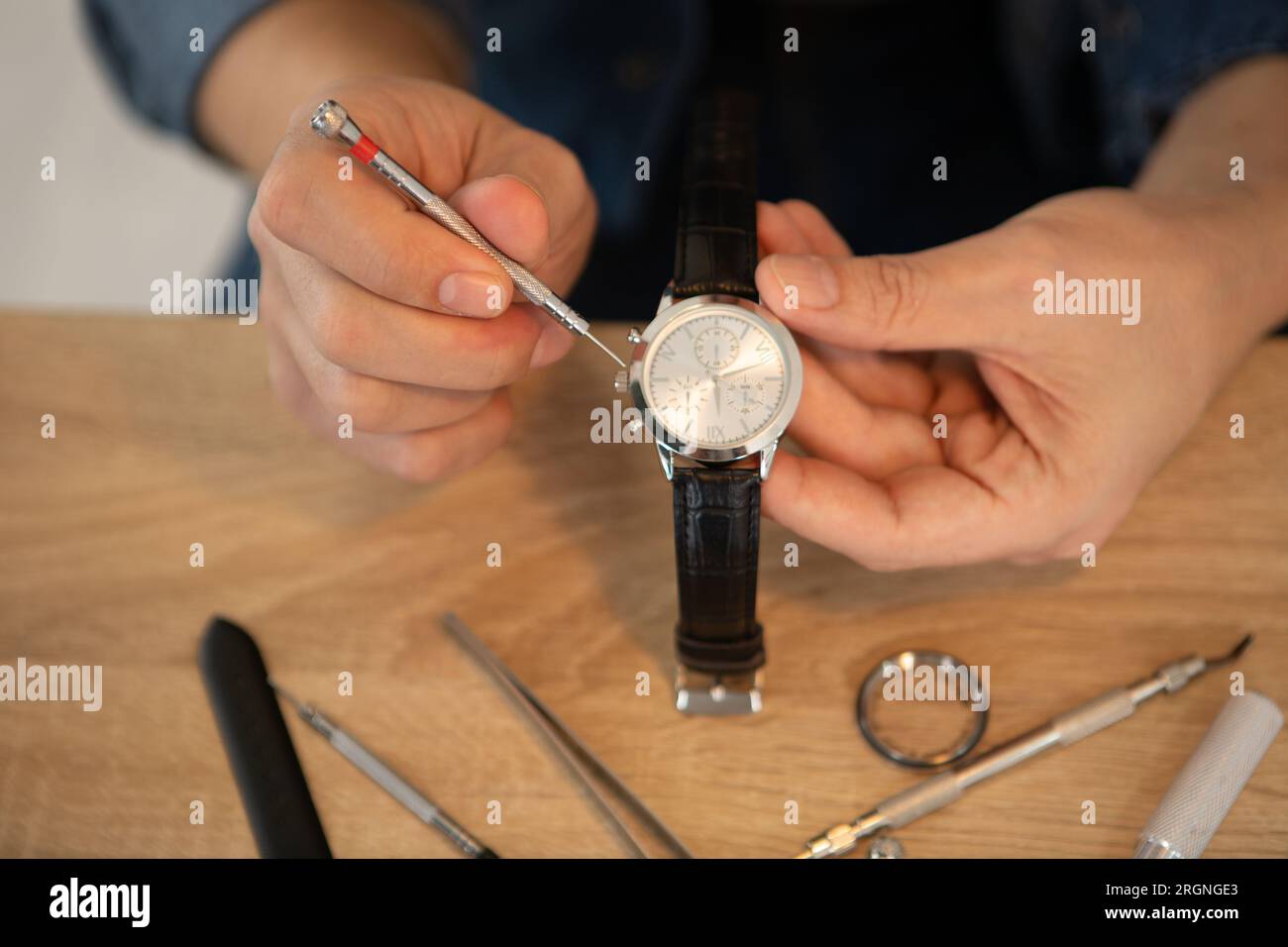 Watch repair hands craft hi-res stock photography and images - Alamy