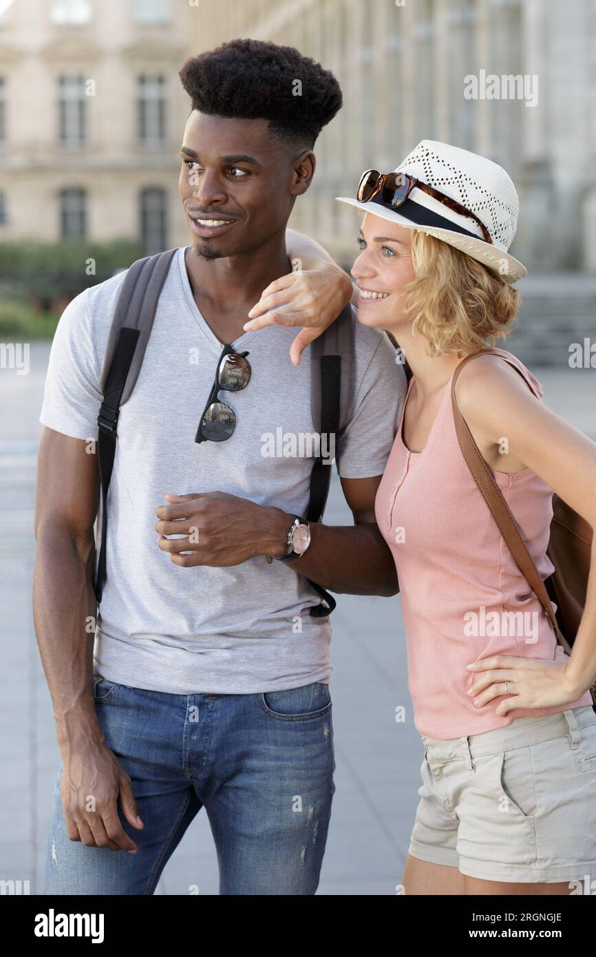 ethnically diverse couple sight seeing together Stock Photo - Alamy