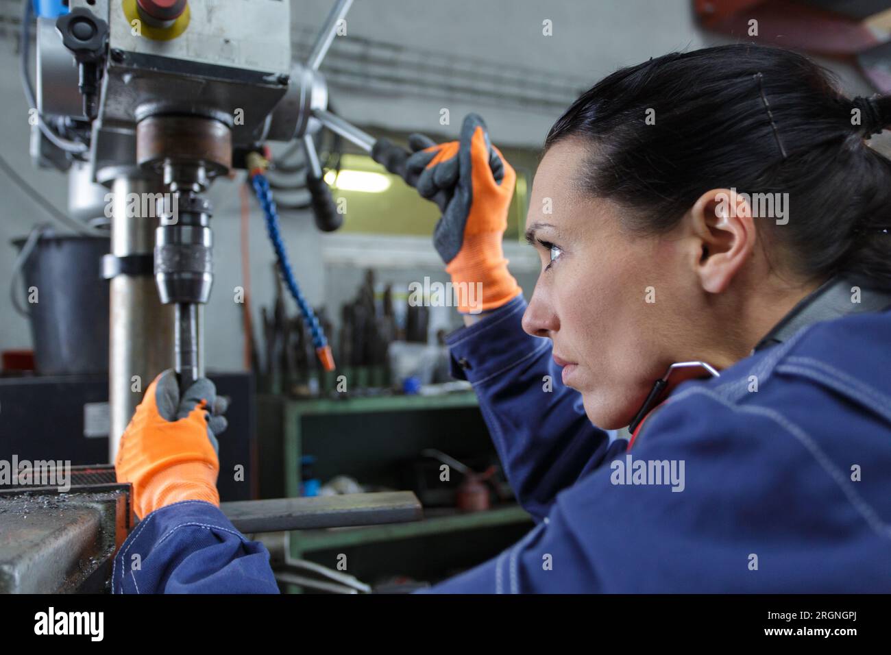 Female worker operating industrial control hi-res stock photography and ...