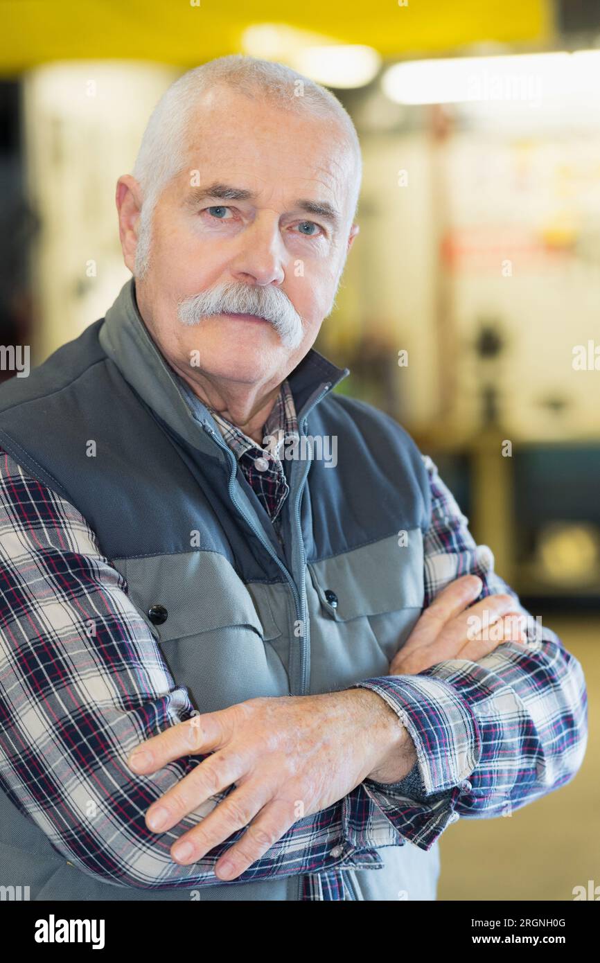 Employee worker uniform older hi-res stock photography and images - Alamy