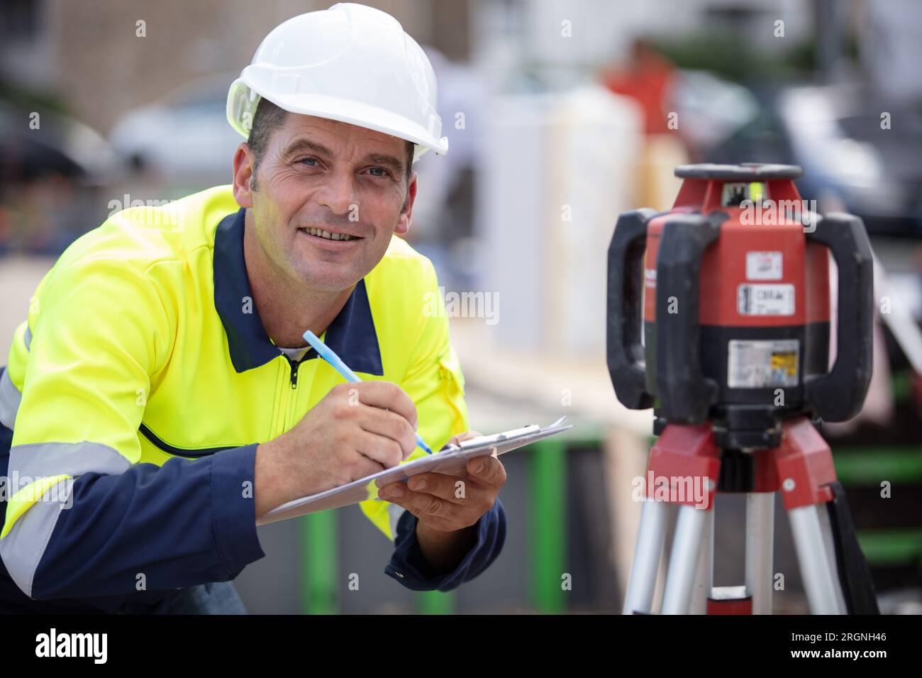 mature man geometer measuring construction place Stock Photo - Alamy