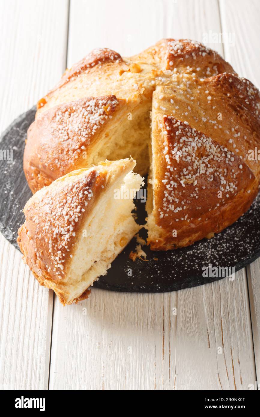 French Easter brioche mouna bread close-up in a plate on the table ...