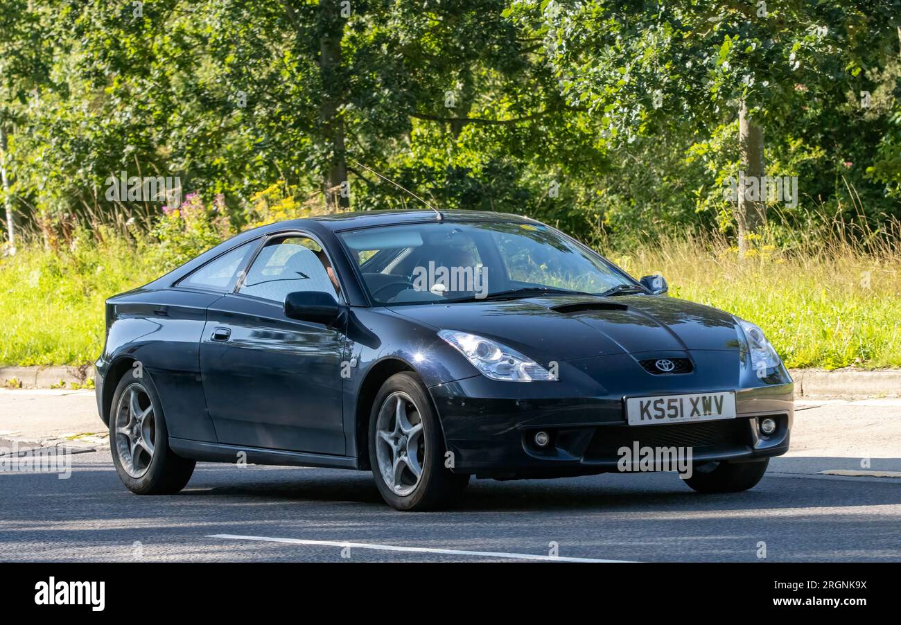 Milton Keynes,UK - Aug 10th 2023: 2001 black Toyota Celica car driving ...
