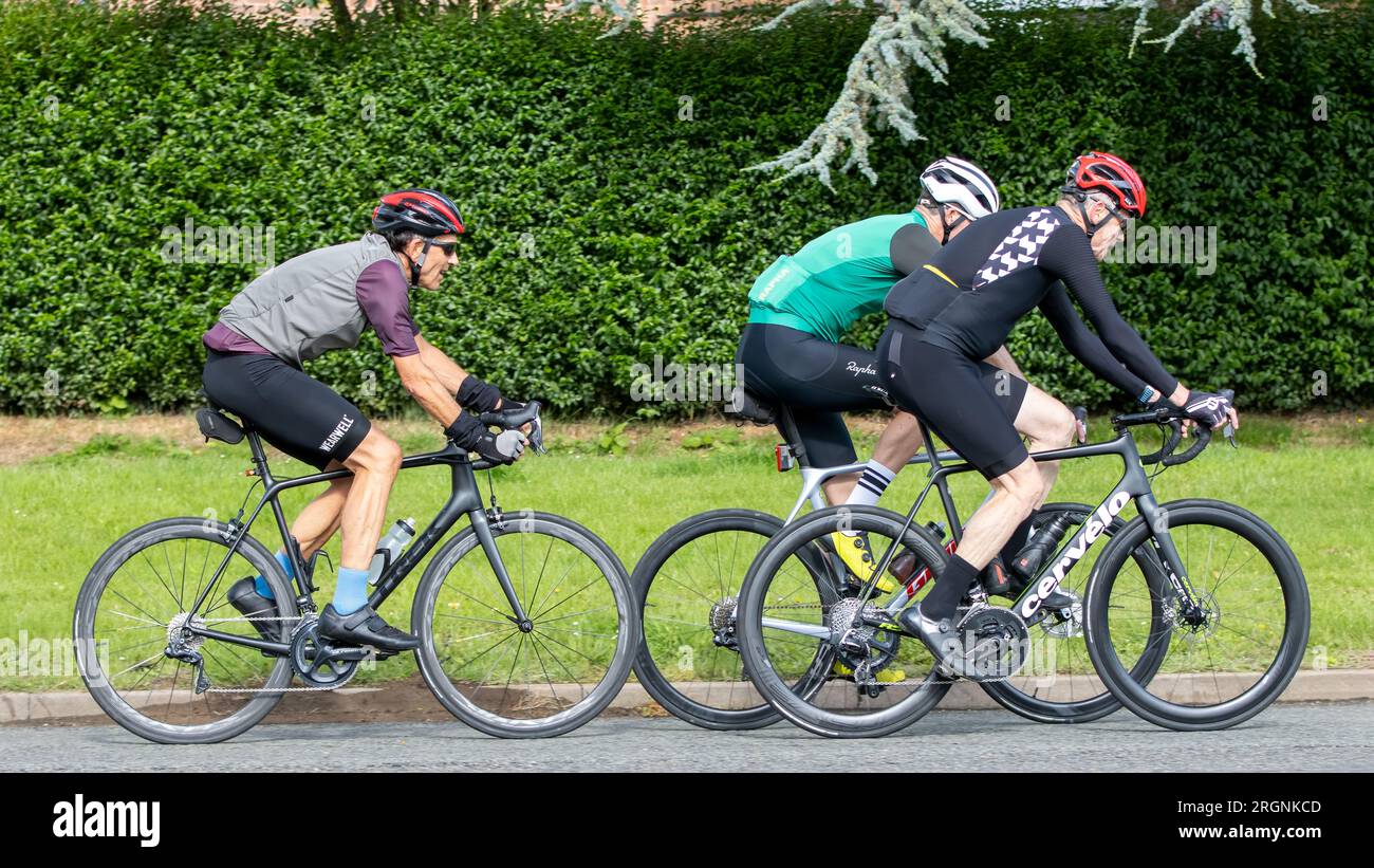 Group of cyclist uk village hi-res stock photography and images - Alamy