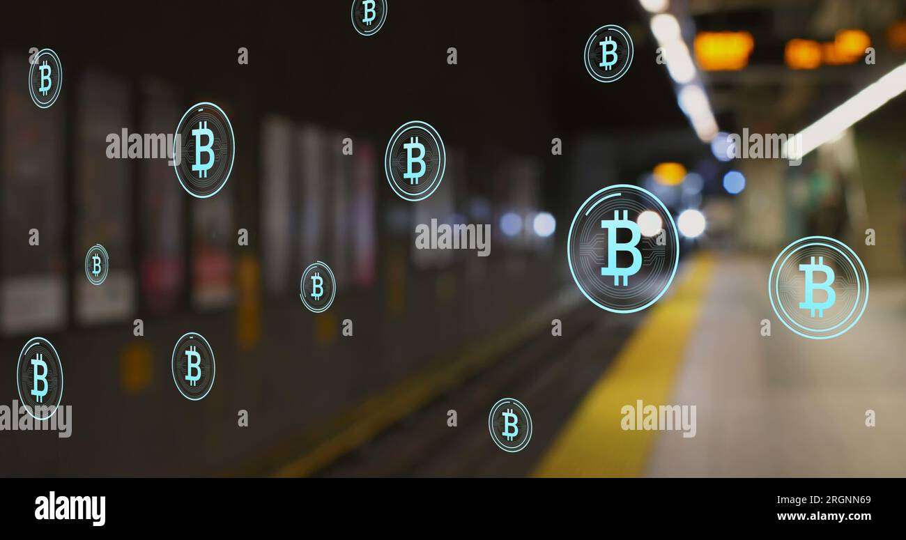 Image of multiple bitcoin symbols floating against blurred view of ...