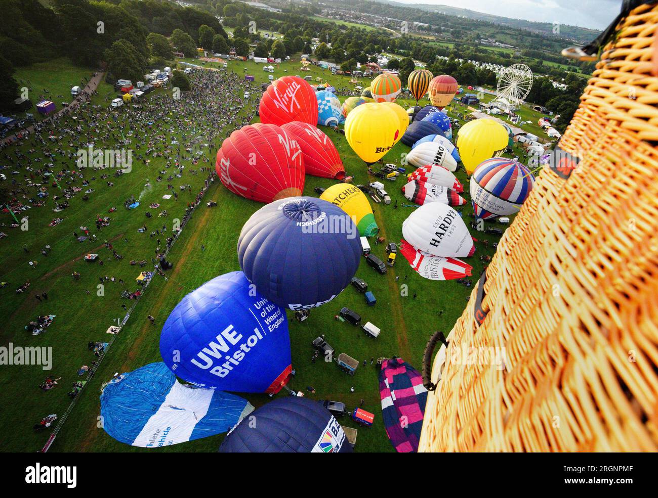 Hot air balloons are inflated during the mass ascent at the Bristol ...