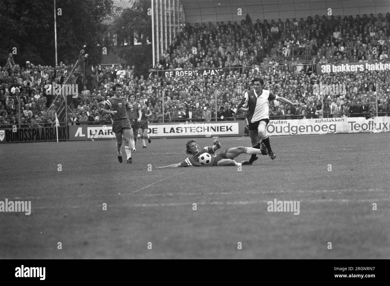 Groningen against Feyenoord 1-4, Ladinsky (right) in action; ca. August ...