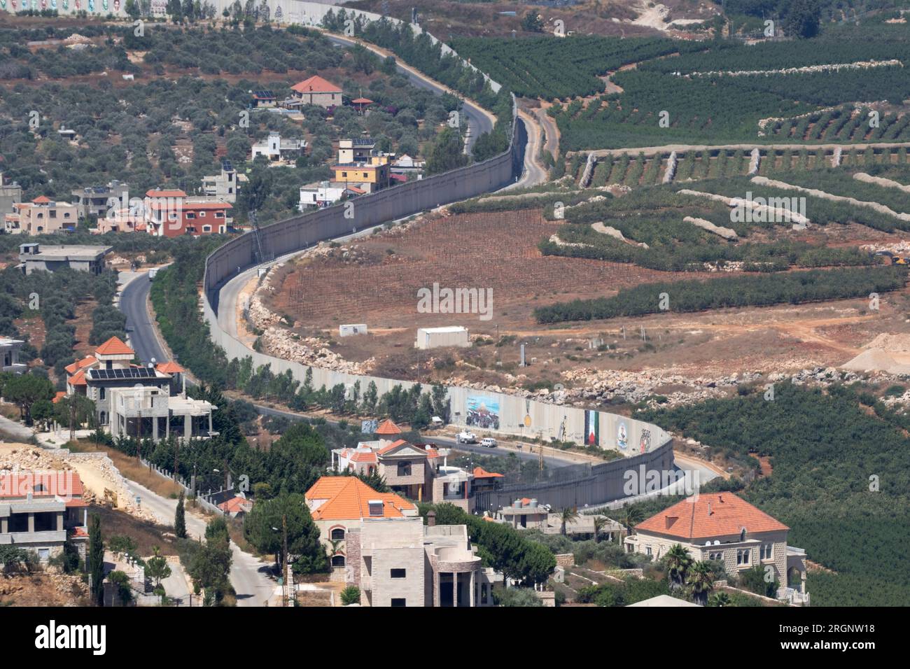 U.N. vehicles can be seen in southern Lebanon from the Israeli side of ...
