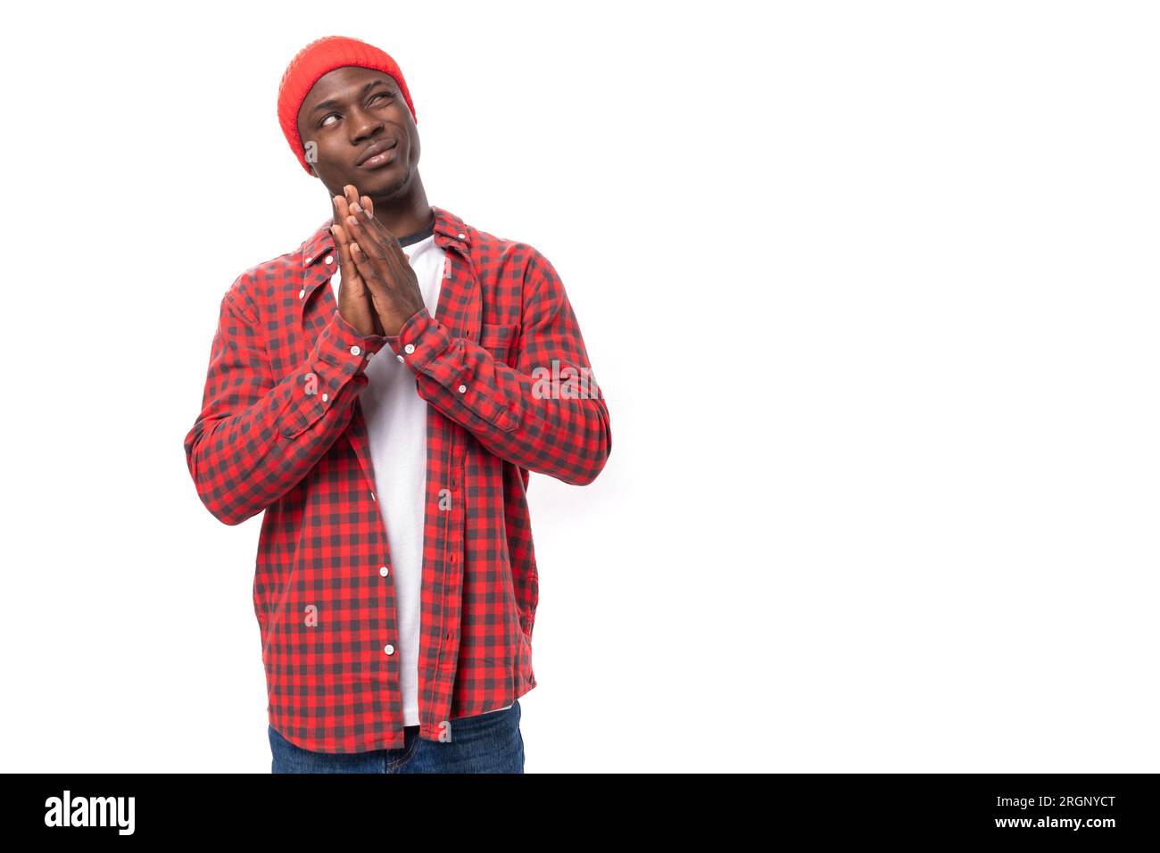 portrait of a dreamy modest 30s black american man dressed in a red ...