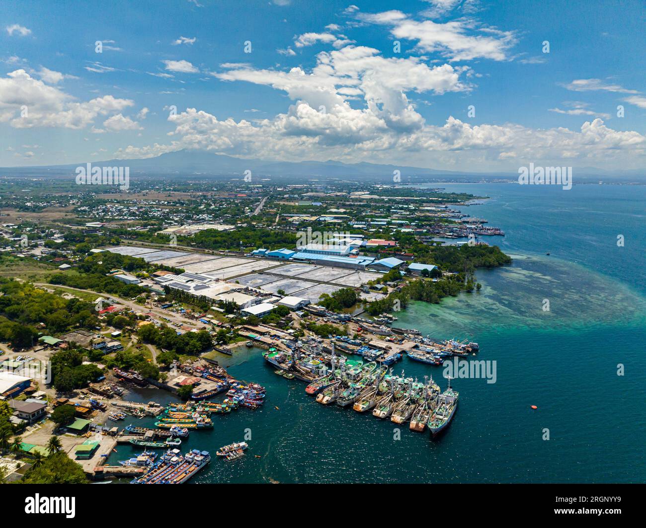 Top view of fishing vessels in coastline of General Santos City Fish Port Complex. Mindanao ...
