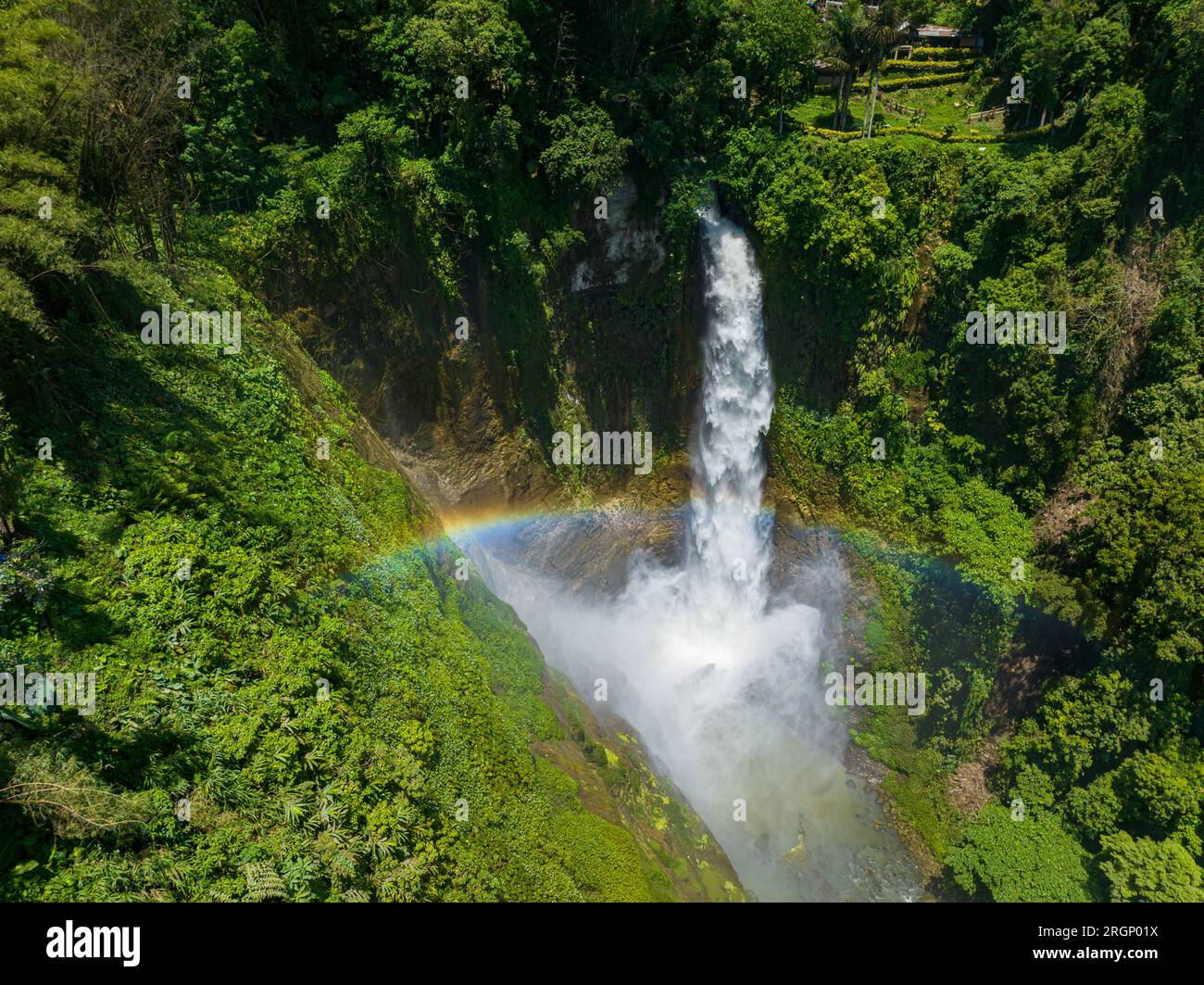 Aerial view of waterfalls wih rainbow. Beautiful splashing of of water ...