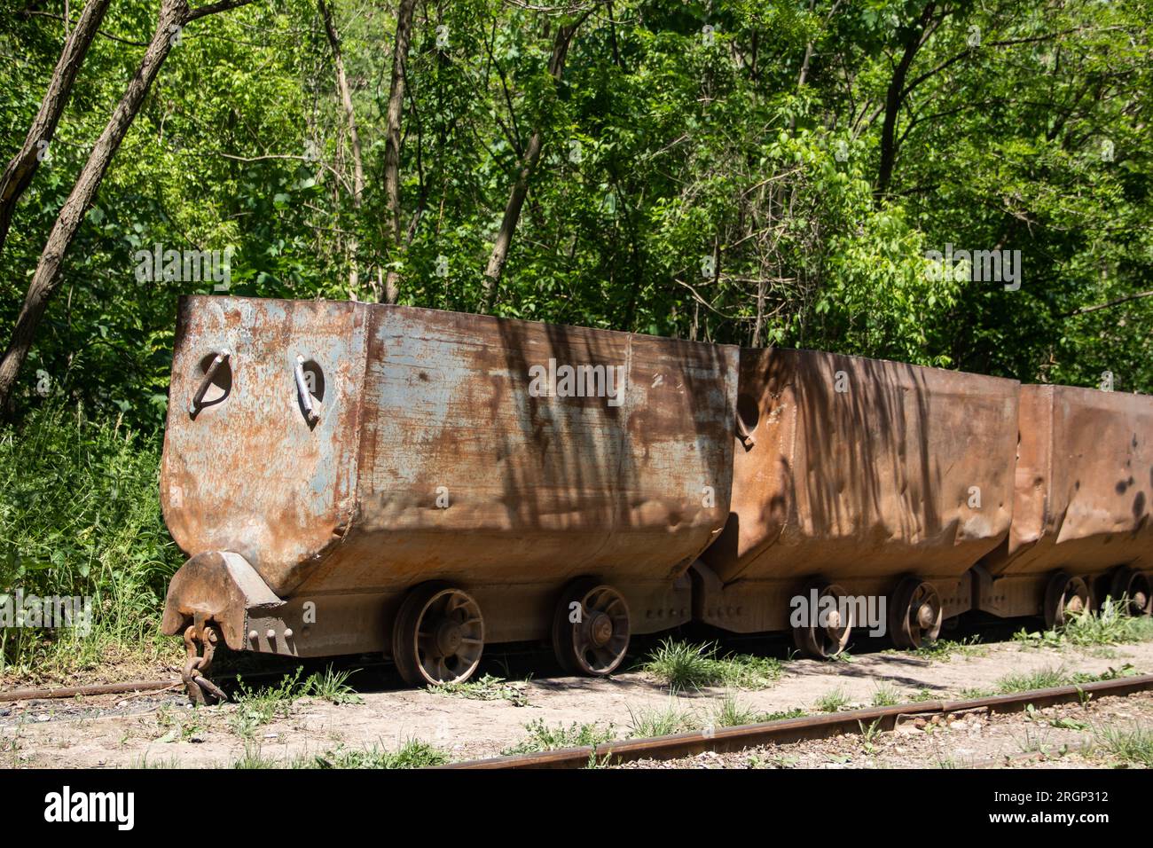 Old rusty train wagon forever parked at an abandoned railway station ...