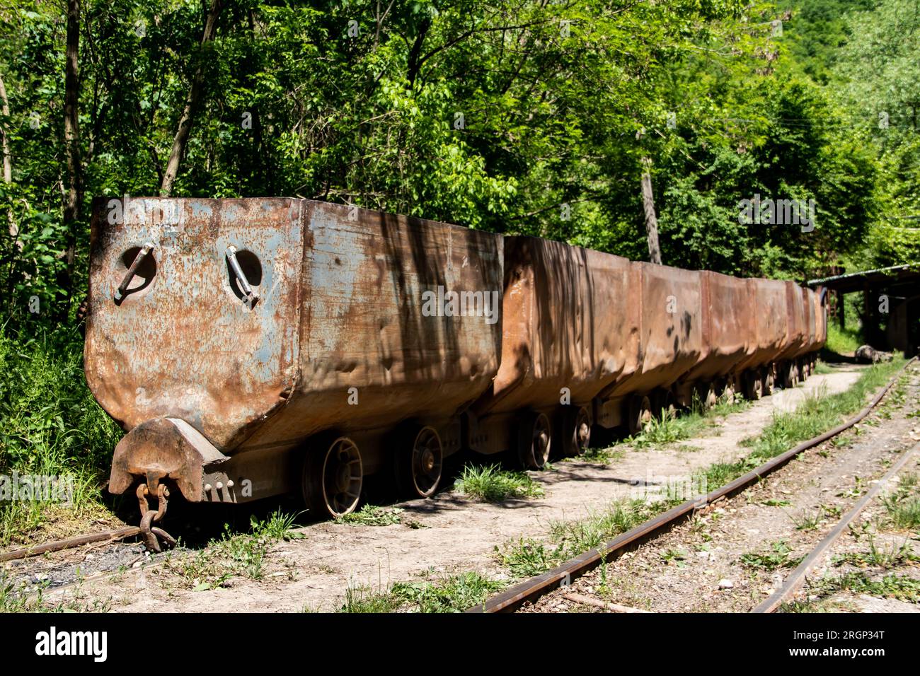 Old rusty train wagon forever parked at an abandoned railway station ...