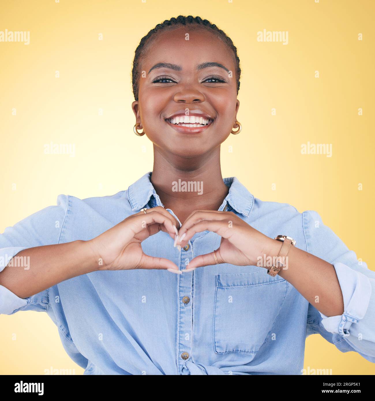 Happy black woman, portrait and heart hands for love, care or support ...