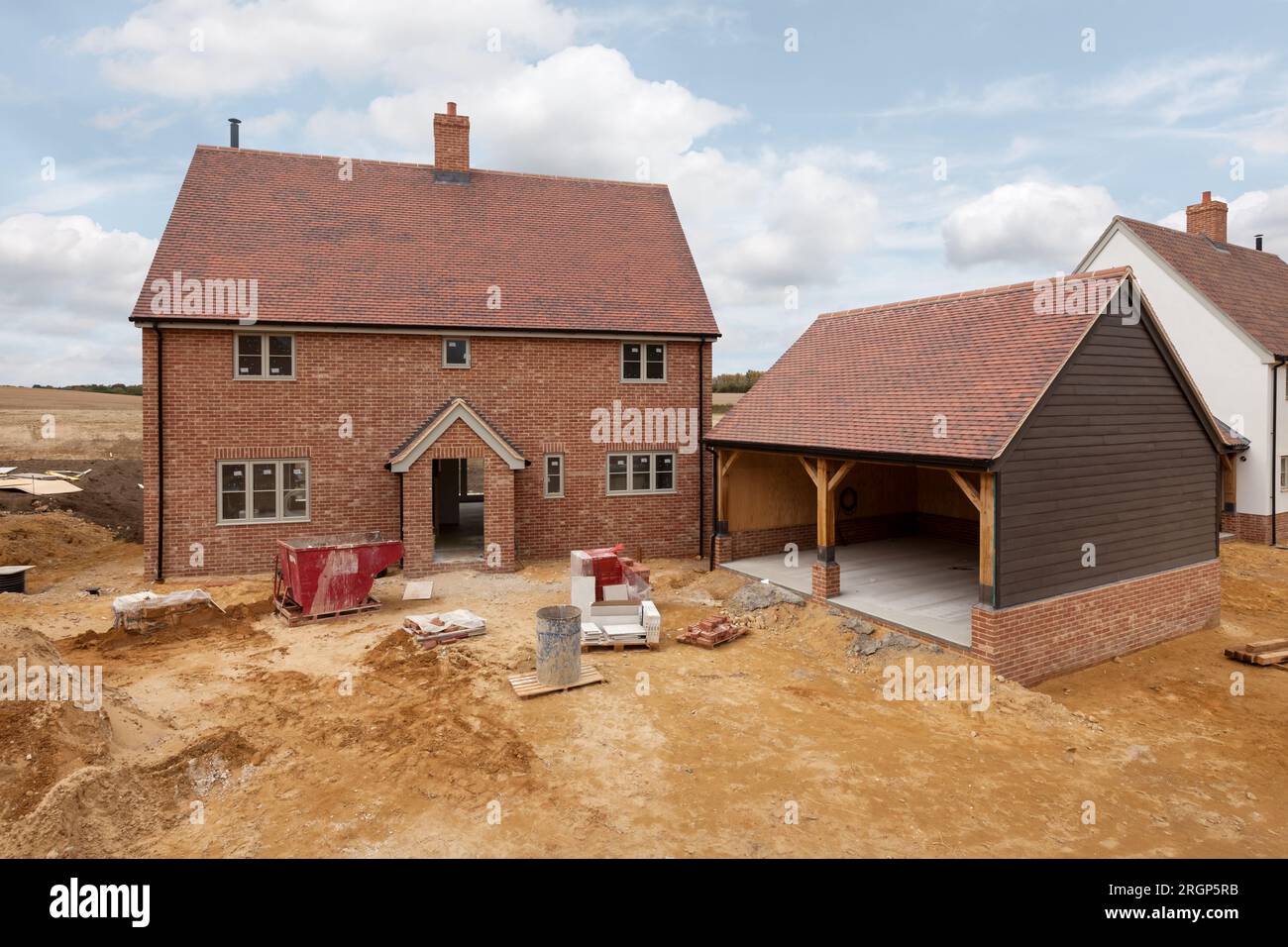 New build luxury housing development under construction with unmade ...