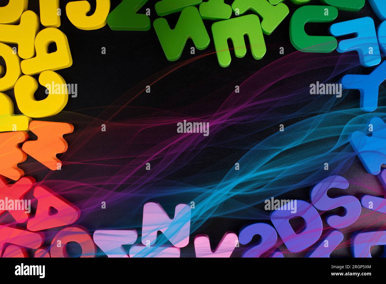 Colorful alphabet letter blocks scattered randomly Stock Photo - Alamy