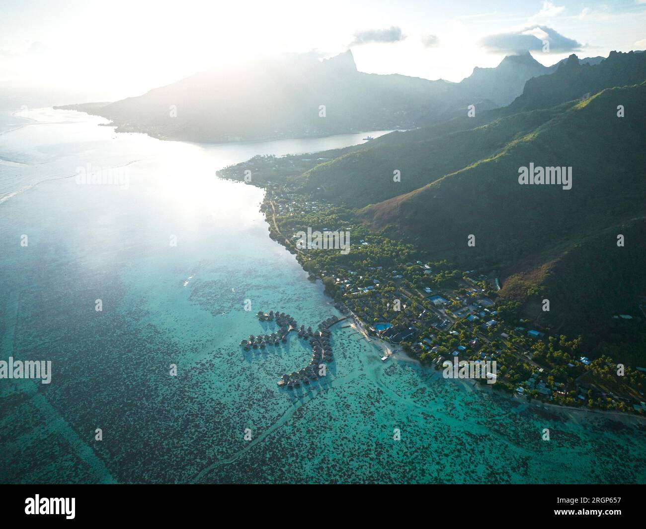 Overwater bungalow resort near the Moorea shore in the morning Stock ...
