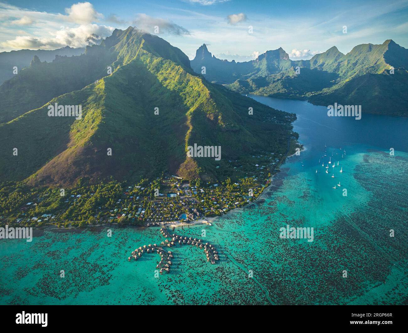 Overwater bungalow resort near the Moorea shore in the morning Stock ...