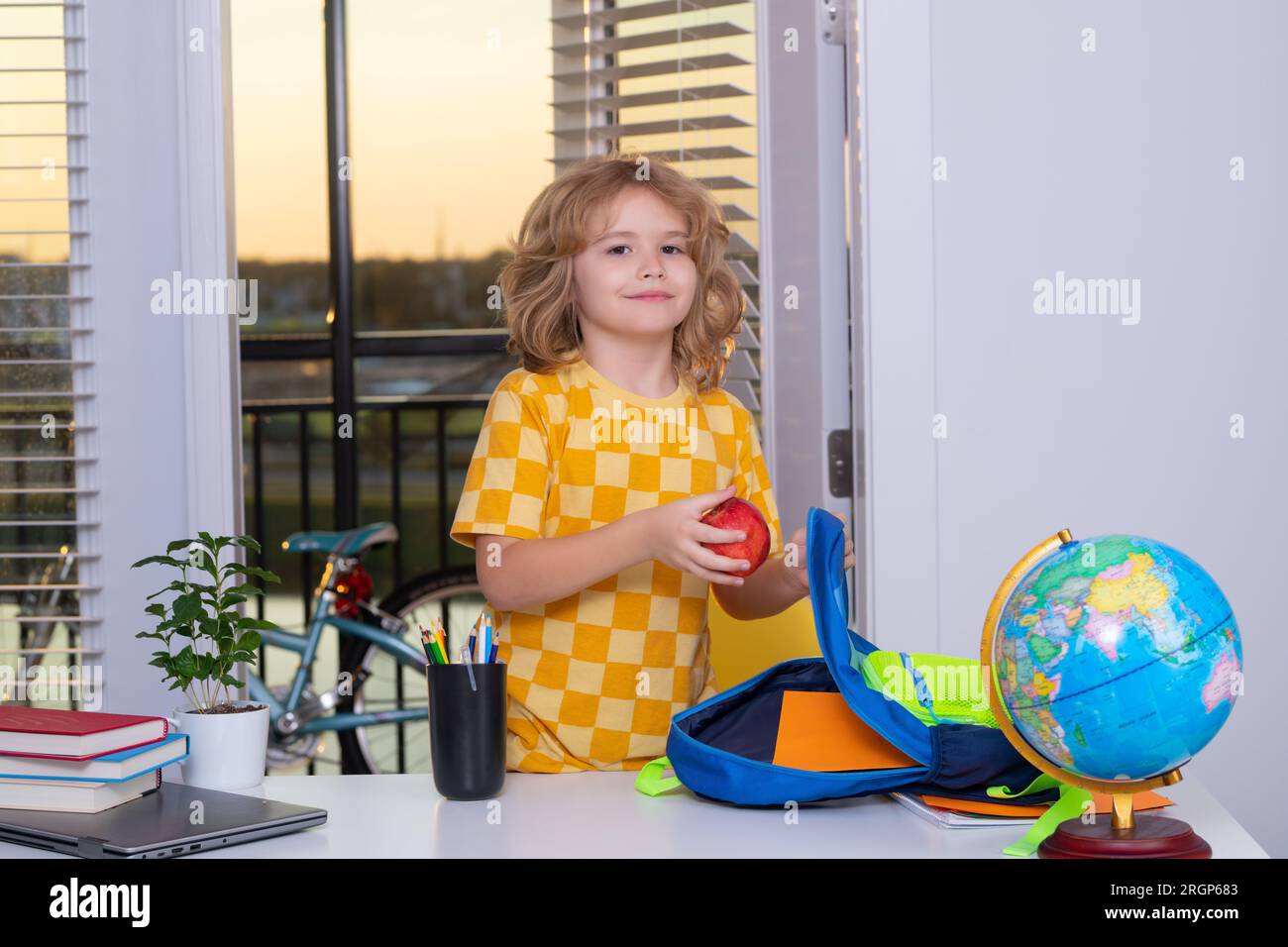 Preparation for school. School kids at home. Child from elementary ...