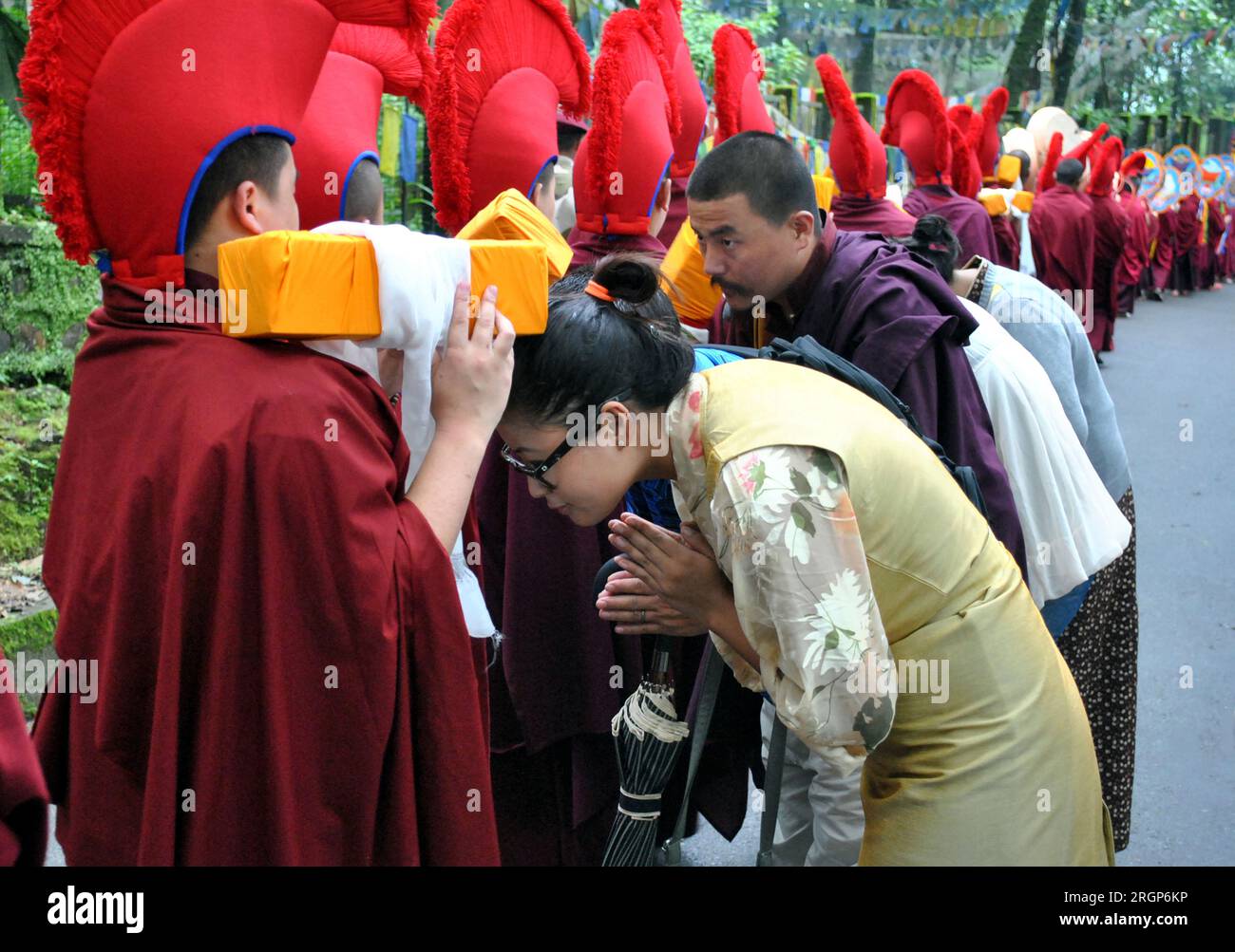 Devotees Get Blessings From Monks Stock Photo - Alamy