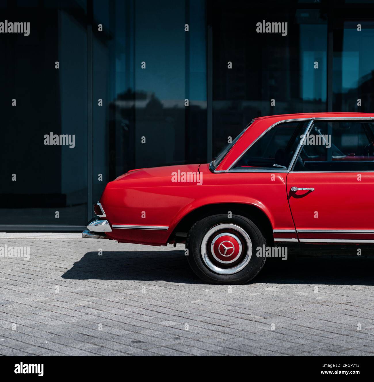 Rear right quarter panel side view of red classic Mercedes-Benz SL W113 ...