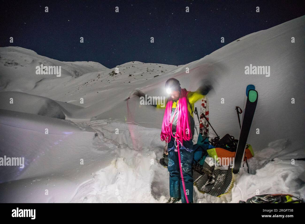 long exposure showing motion of a climber coiling rope Stock Photo - Alamy