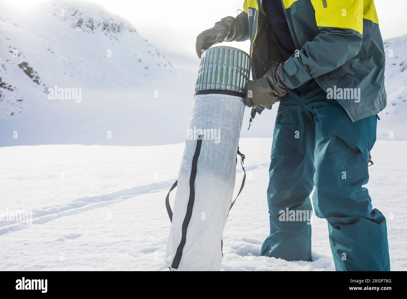 close up of camper packing gear in stuff sack Stock Photo - Alamy