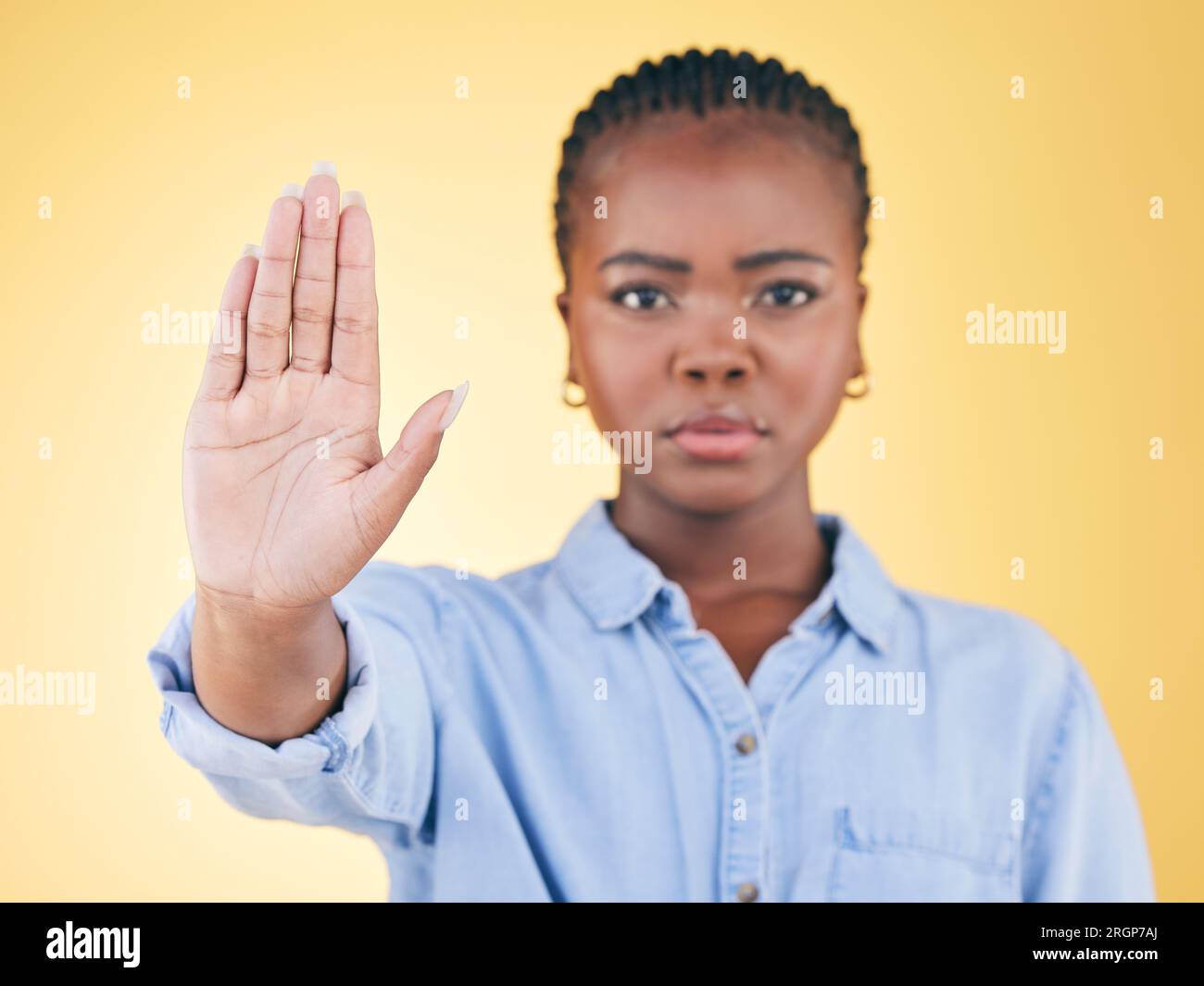 Black woman, hand and stop, warning and caution in portrait with ...