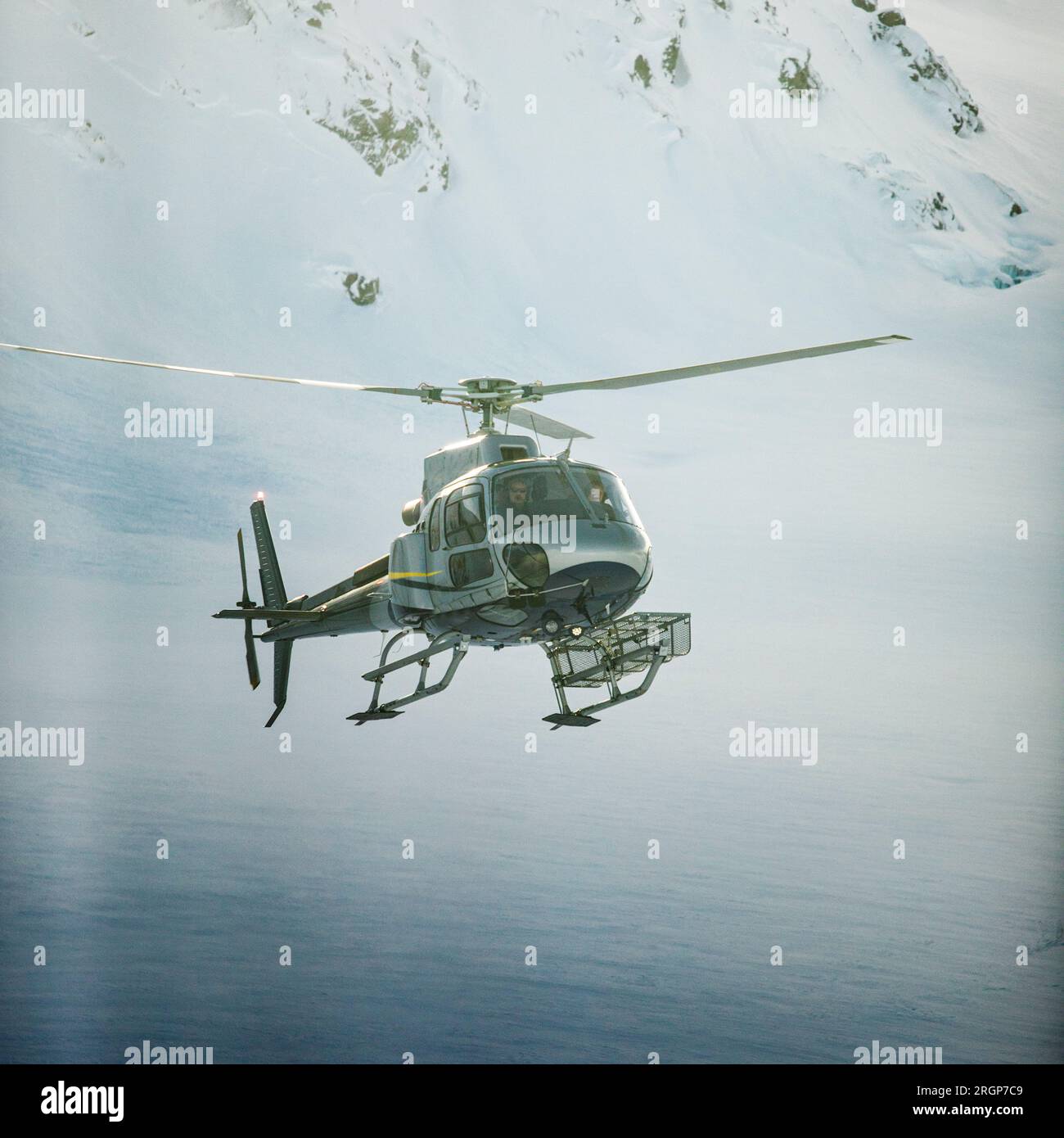 Square crop of helicopter flying in mid-air Stock Photo - Alamy