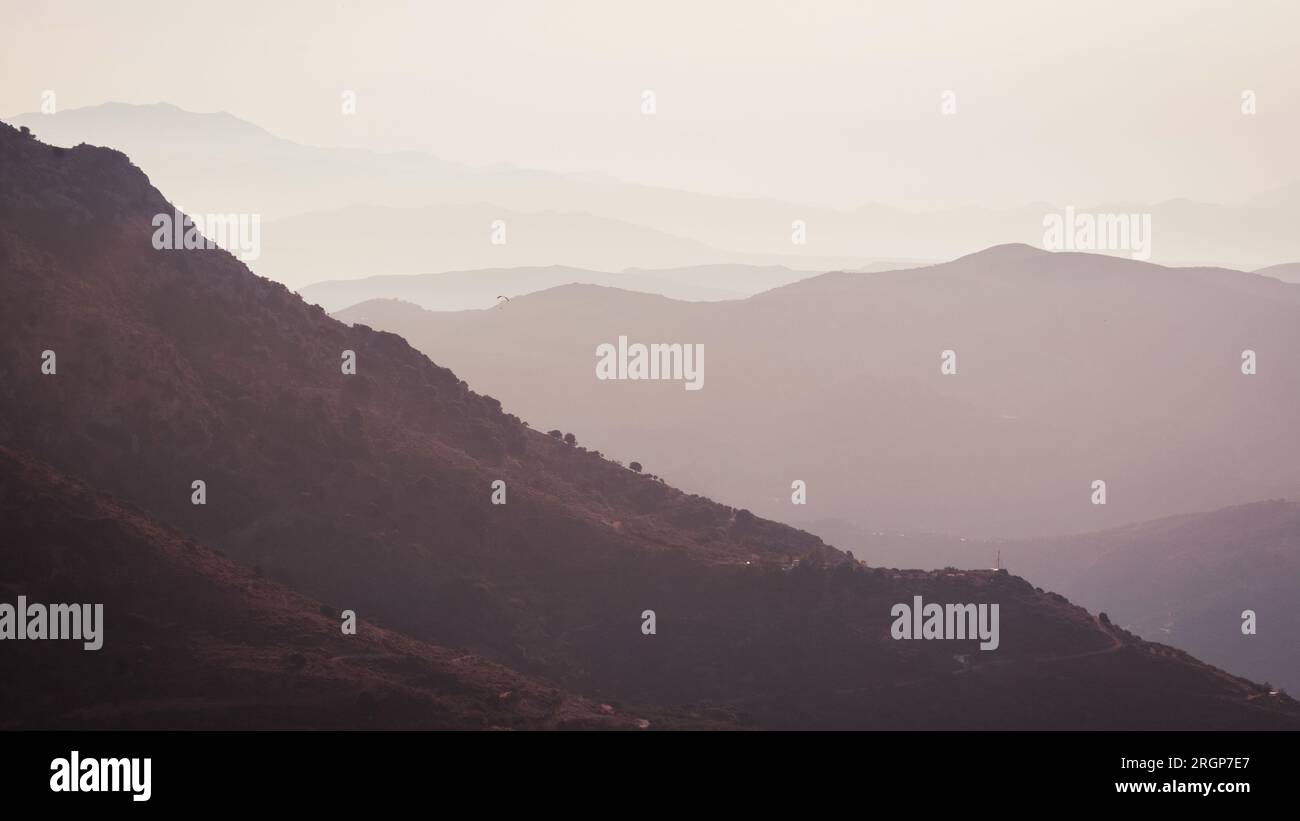 View from Lasithi plateau at dusk. Maroon-purple toned photo of ...