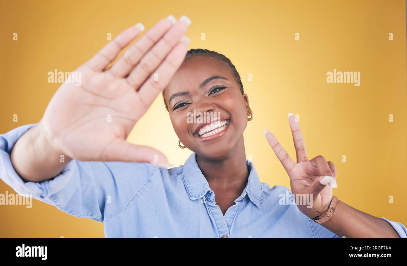 Selfie, peace sign and smile with portrait of black woman in studio for ...