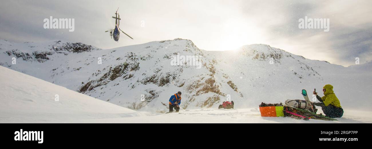Panorama view of helicopter flying home after drop off Stock Photo - Alamy