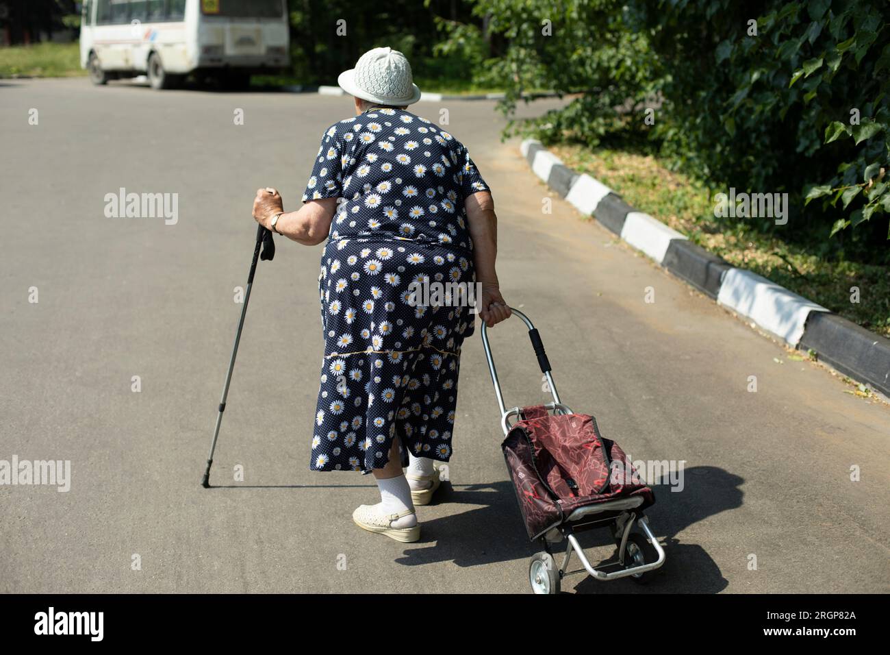 Old woman with stick hi-res stock photography and images - Alamy