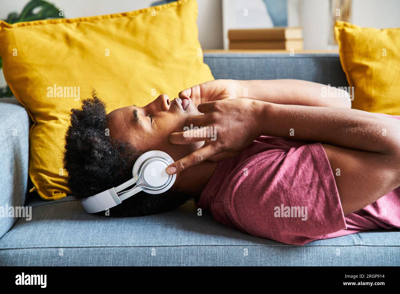 Side portrait of a relaxed man listening to music Stock Photo - Alamy
