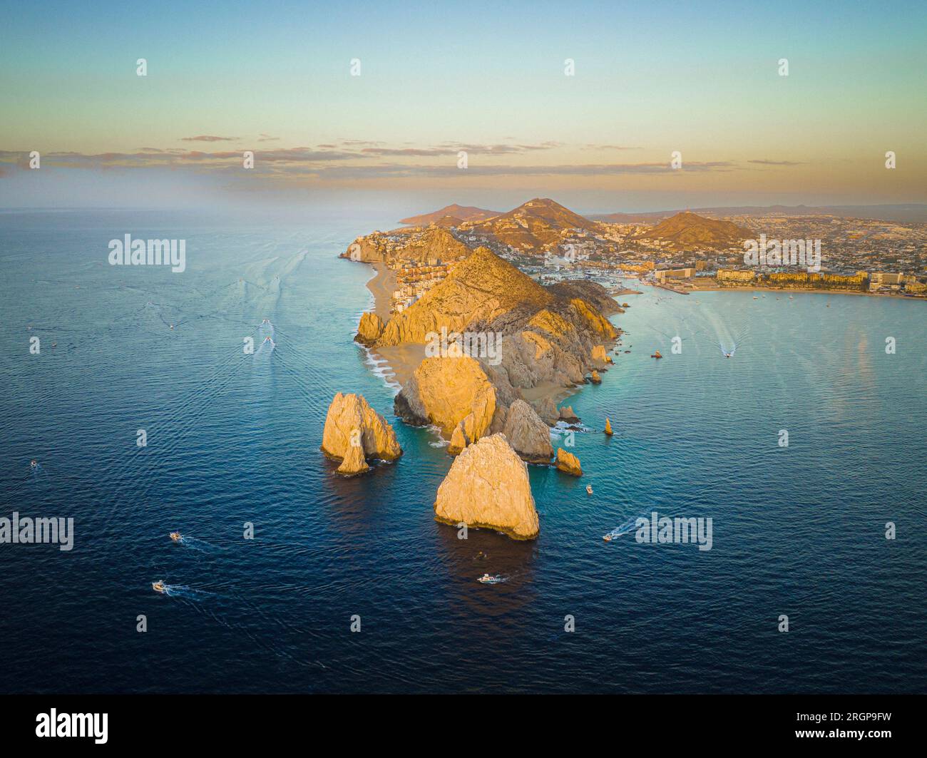 Fishing boats near the famous El Arco rock formations, Baja California ...