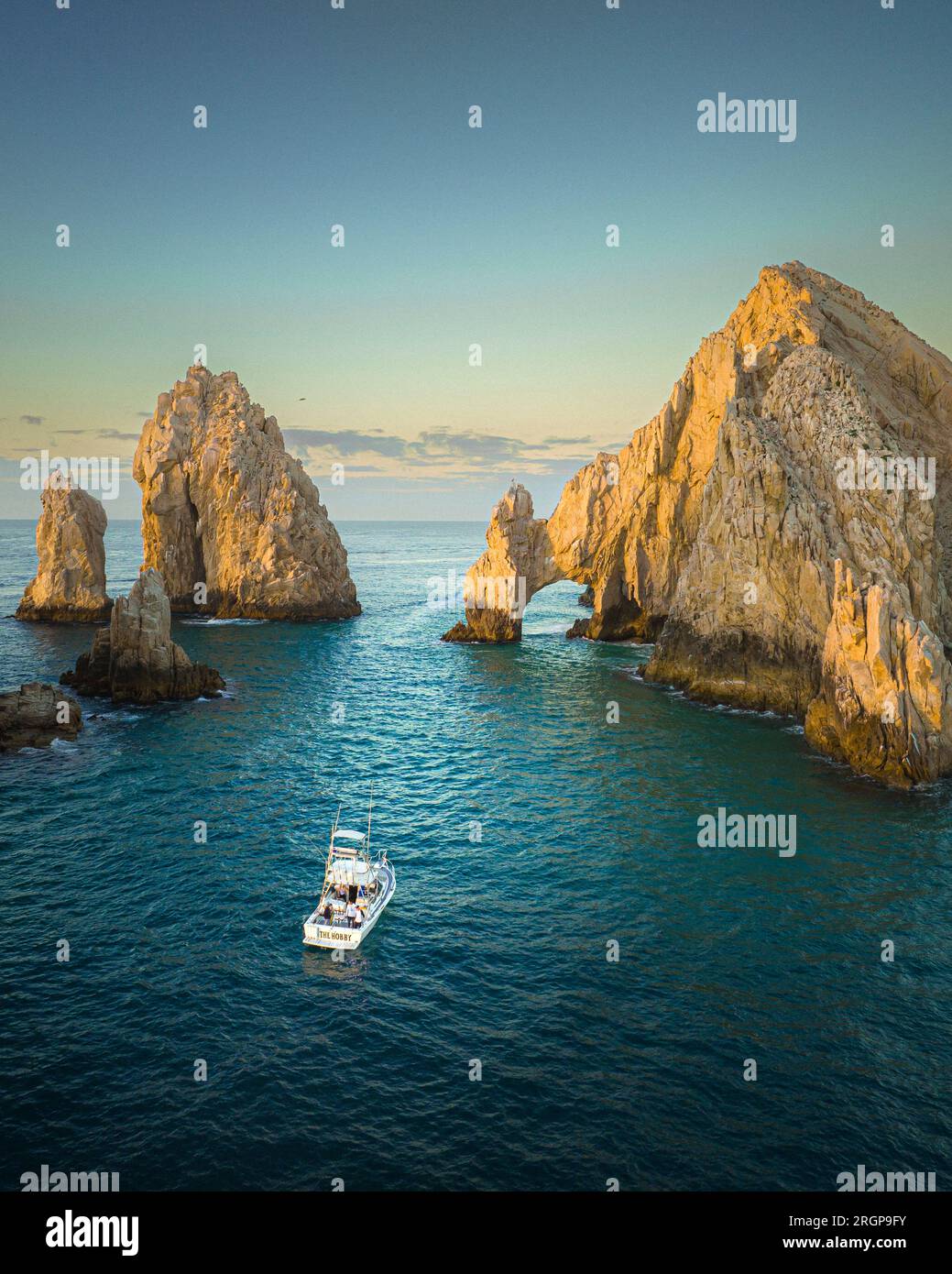Fishing boat near the famous El Arco rock formations, Baja California ...