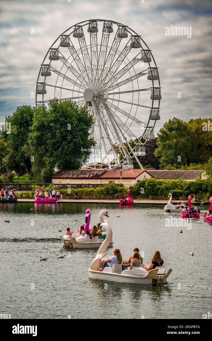 People enjoying the sunshine on the Marine Lake in Southport, in ...