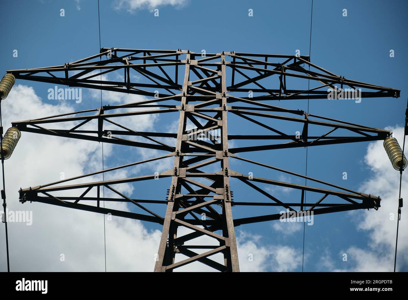 High-voltage power line, electricity pylon, power line mast against the ...
