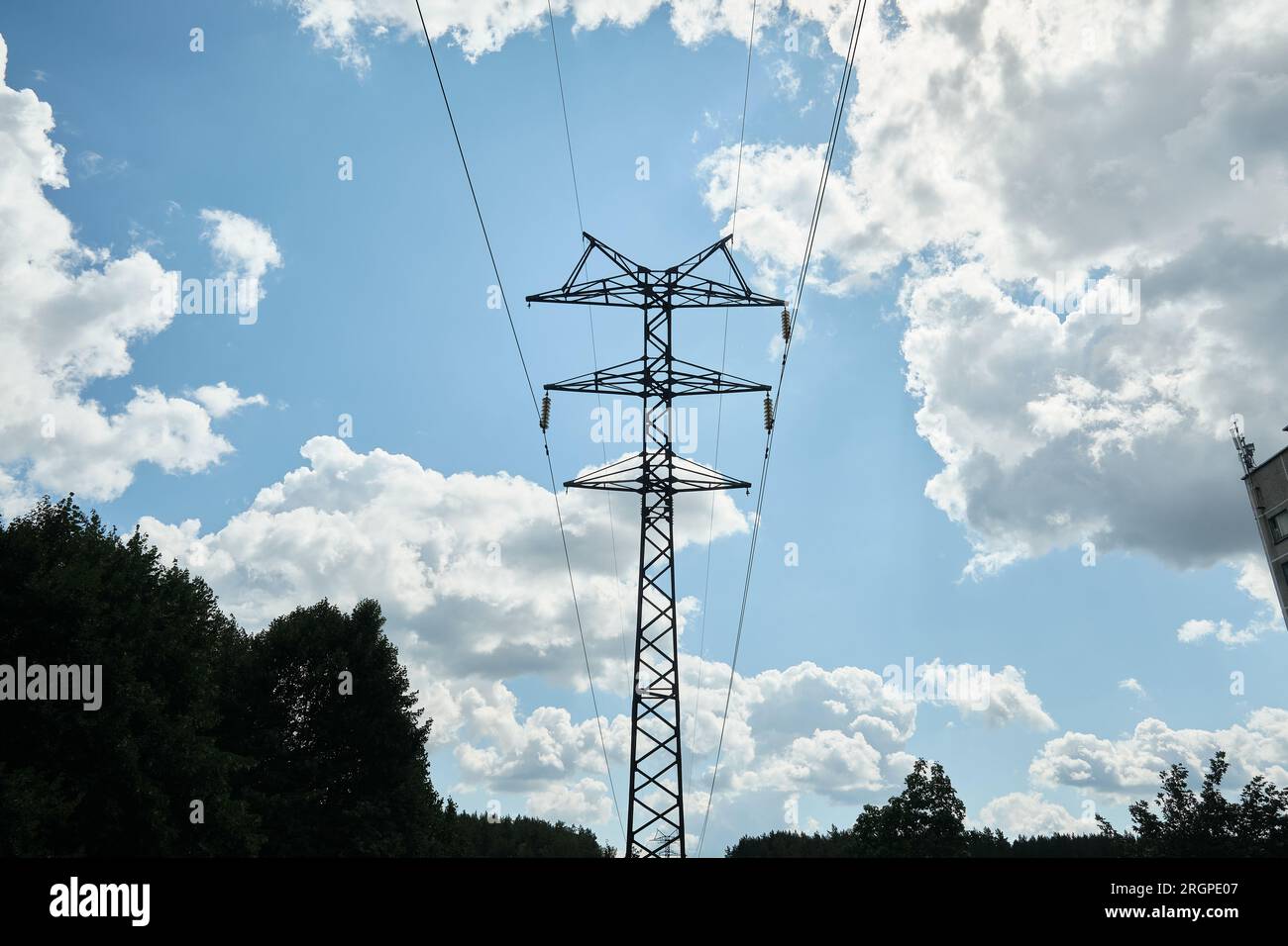 High-voltage power line, electricity pylon, power line mast against the ...