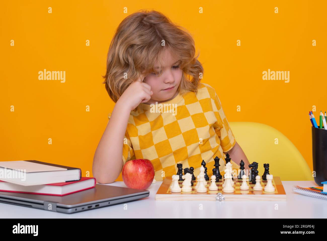 Chess school. Child think about chess game. Intelligent, smart and ...