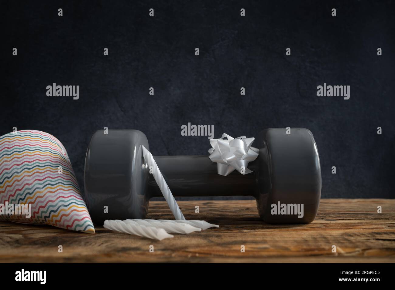 Gym dumbbell, cone hat, bow, cake candles. Exercise equipment as gift ...