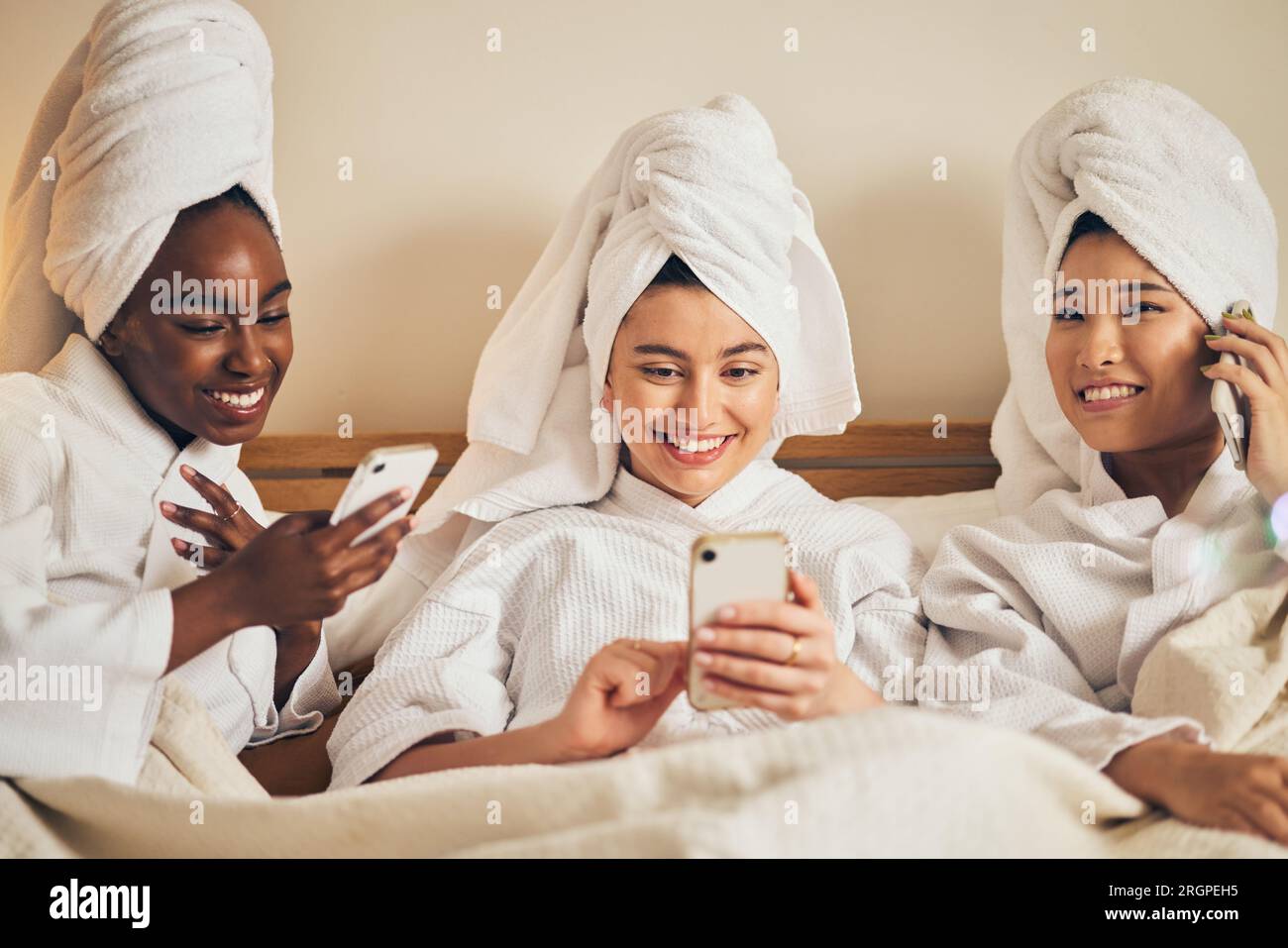 Spa day, sleepover and friends with phone in bed relax with social ...