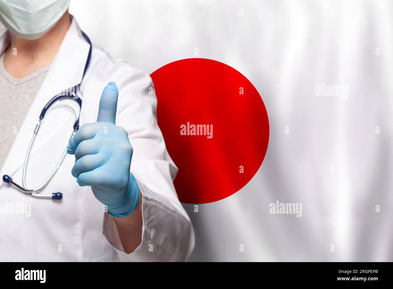 Japan flag showing thumb hi-res stock photography and images - Alamy