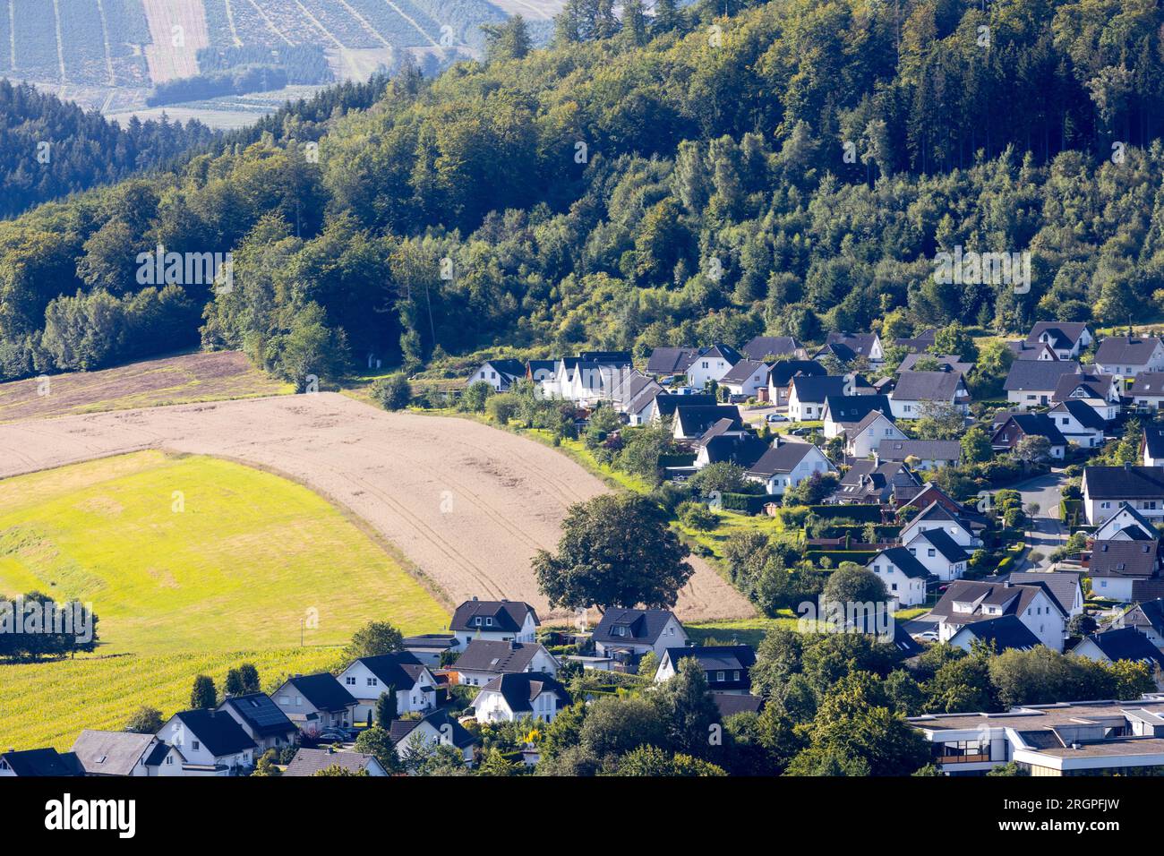Olsberg, Germany. 11th Aug, 2023. Rural housing estate near Bestwig in ...