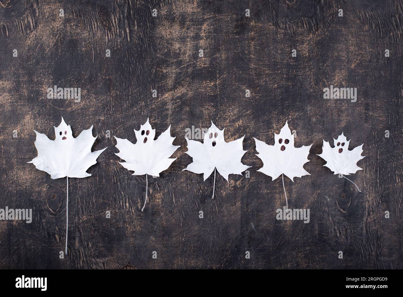 Halloween ghost from autumn leaves Stock Photo - Alamy