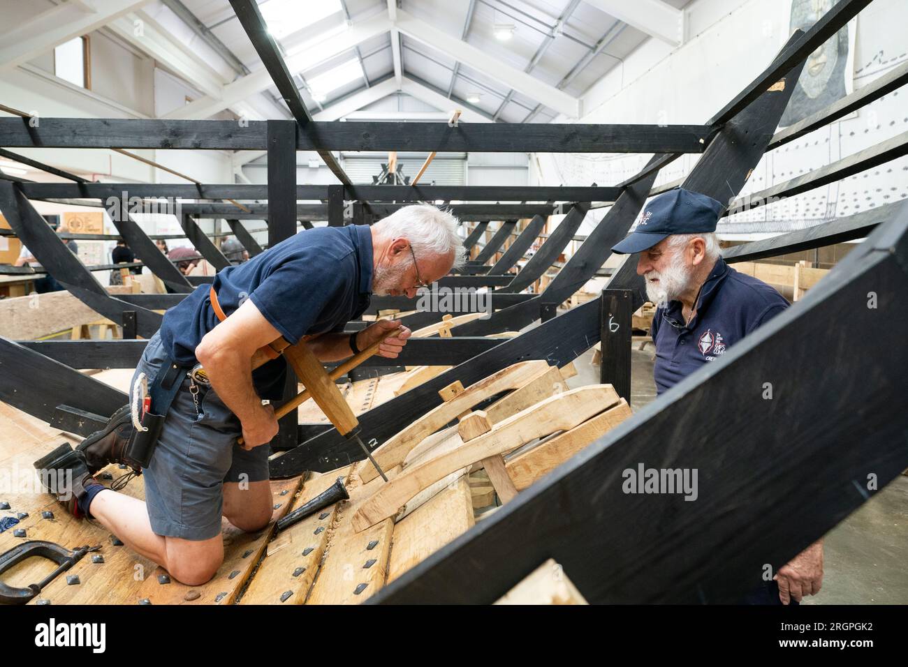 Mike Pratt and David Steptoe work on the replica of the Sutton Hoo ...
