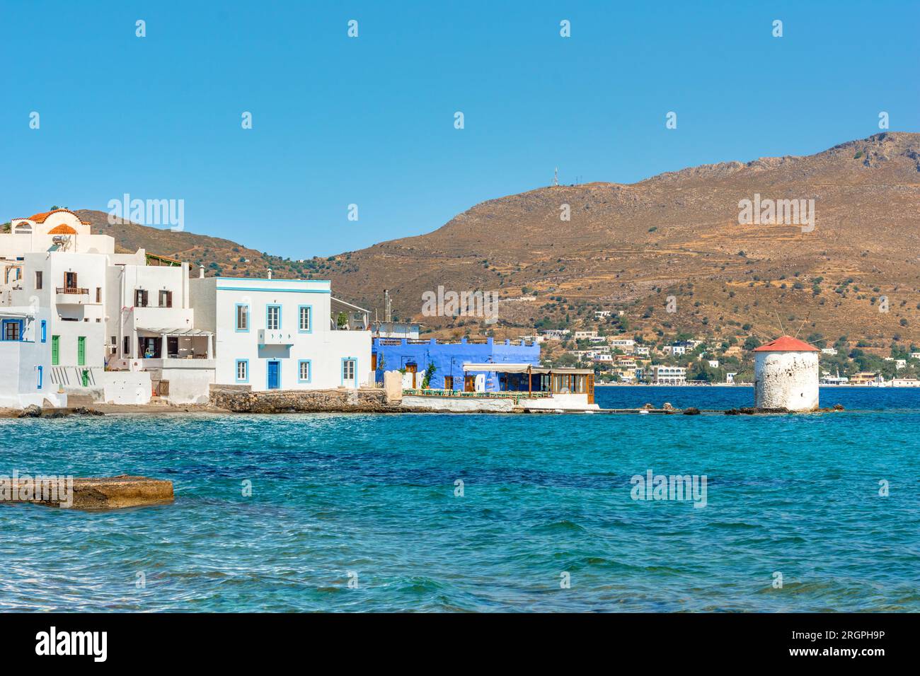 Picturesque village of Agia Marina, windmills and castle of Panteli in ...