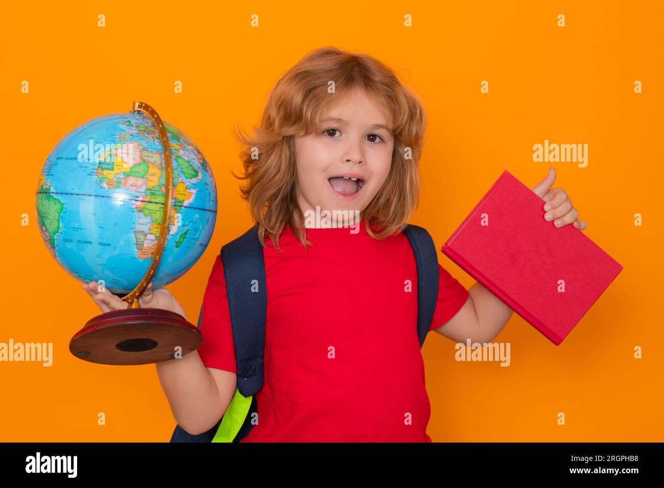 School children. School pupil with world globe and book. Studio ...