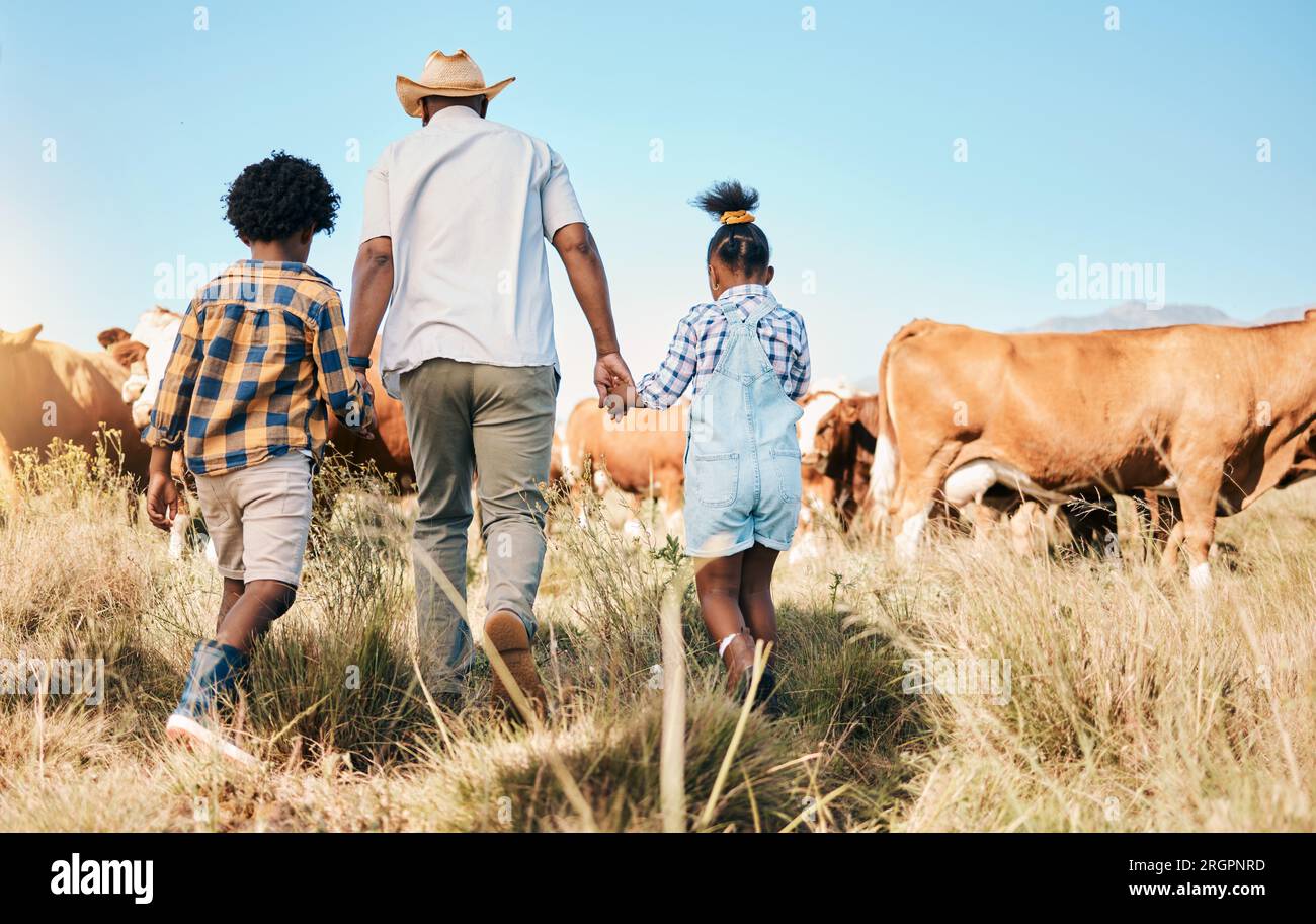 Farm, cows and father holding hands with children in countryside for ...