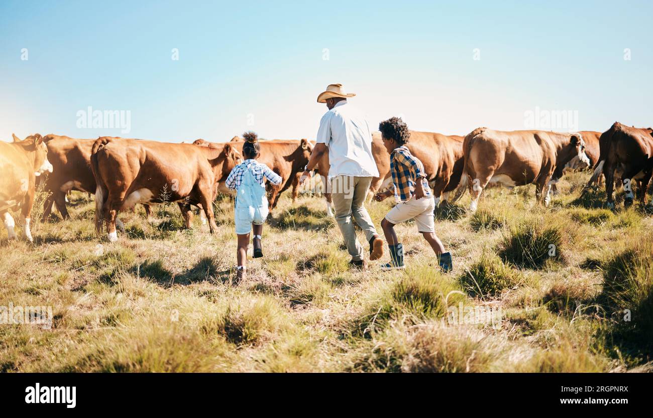 Farm, cattle and father holding hands with children in countryside for ...